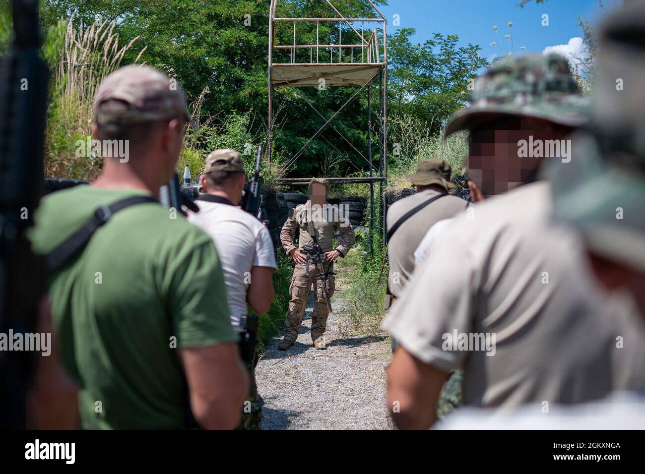 A U.S. Army Green Beret assigned to 10th Special Forces Group observes ...