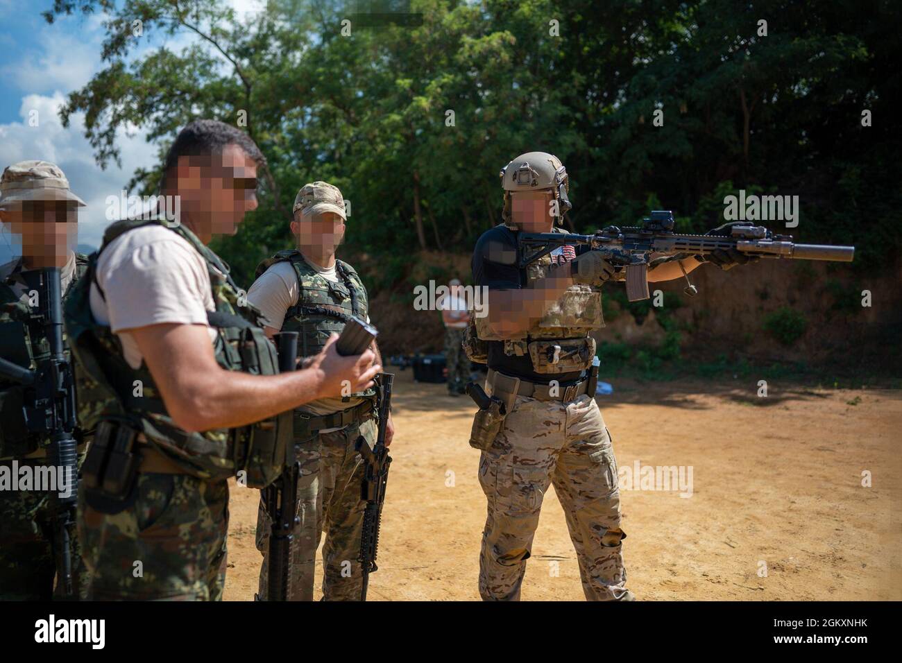 A U.S. Army Green Beret assigned to 10th Special Forces Group shares ...
