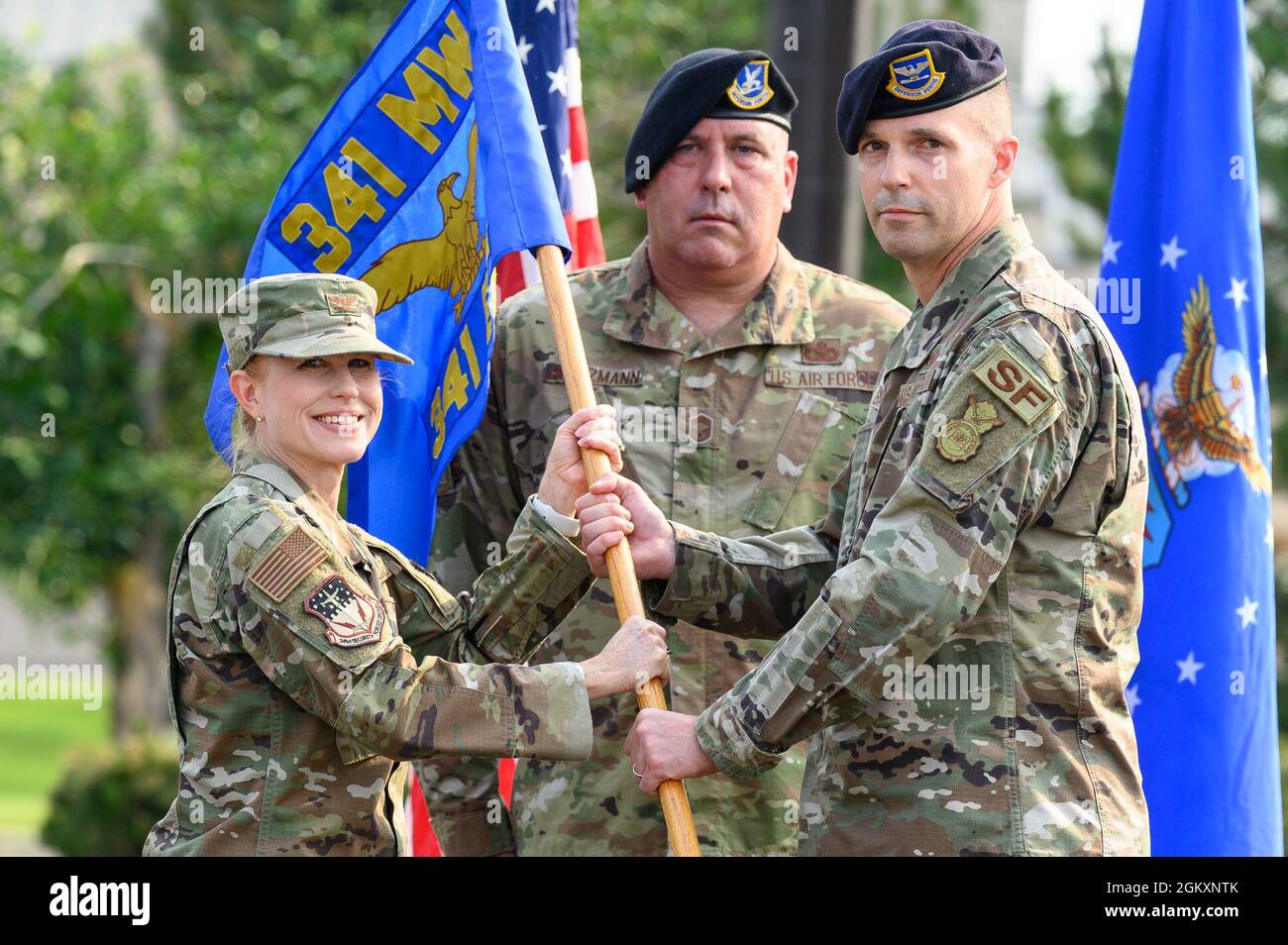 Col. Steven Bauman, right, accepts command of the 341st Security Forces Group from Col. Anita ...