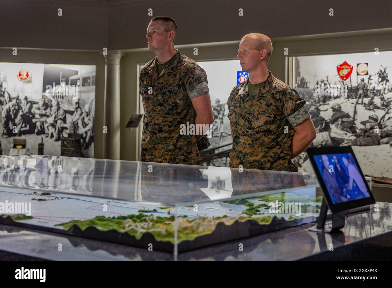U.S. Marine Corps Private First Class Preston W. Beverly (left), and ...