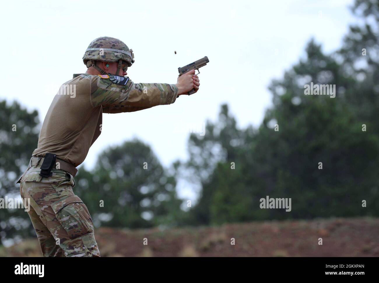 Spc. Henry Brucken, 1-151 Infantry, Indiana National Guard, to fires a ...