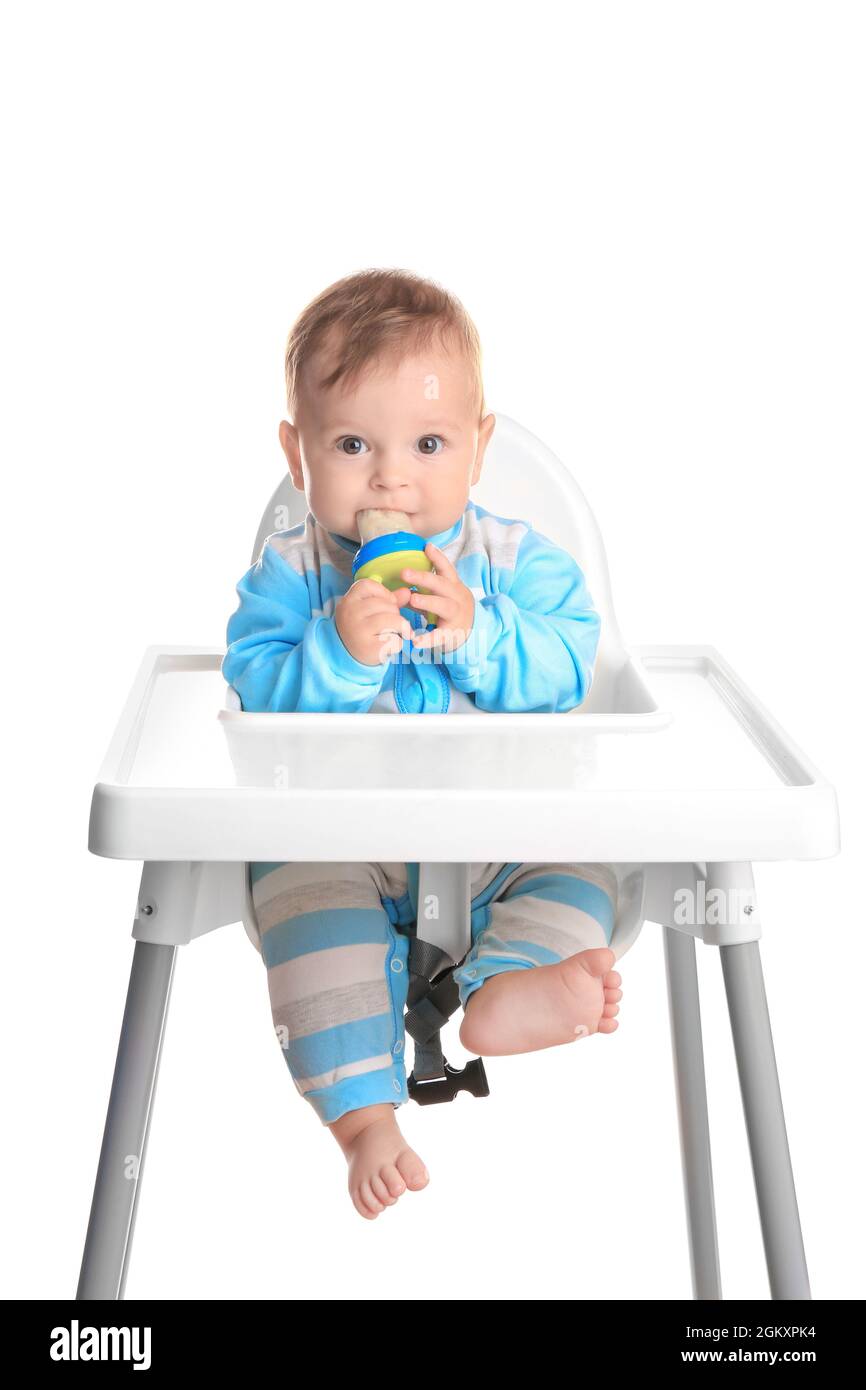 Cute little baby with nibbler on white background Stock Photo - Alamy