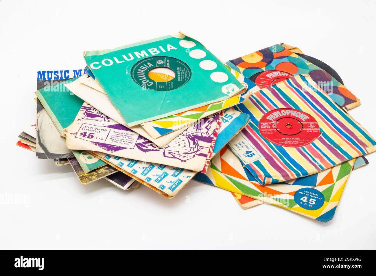assorted seven inch single vinyl 45rpm records in colourful paper ...