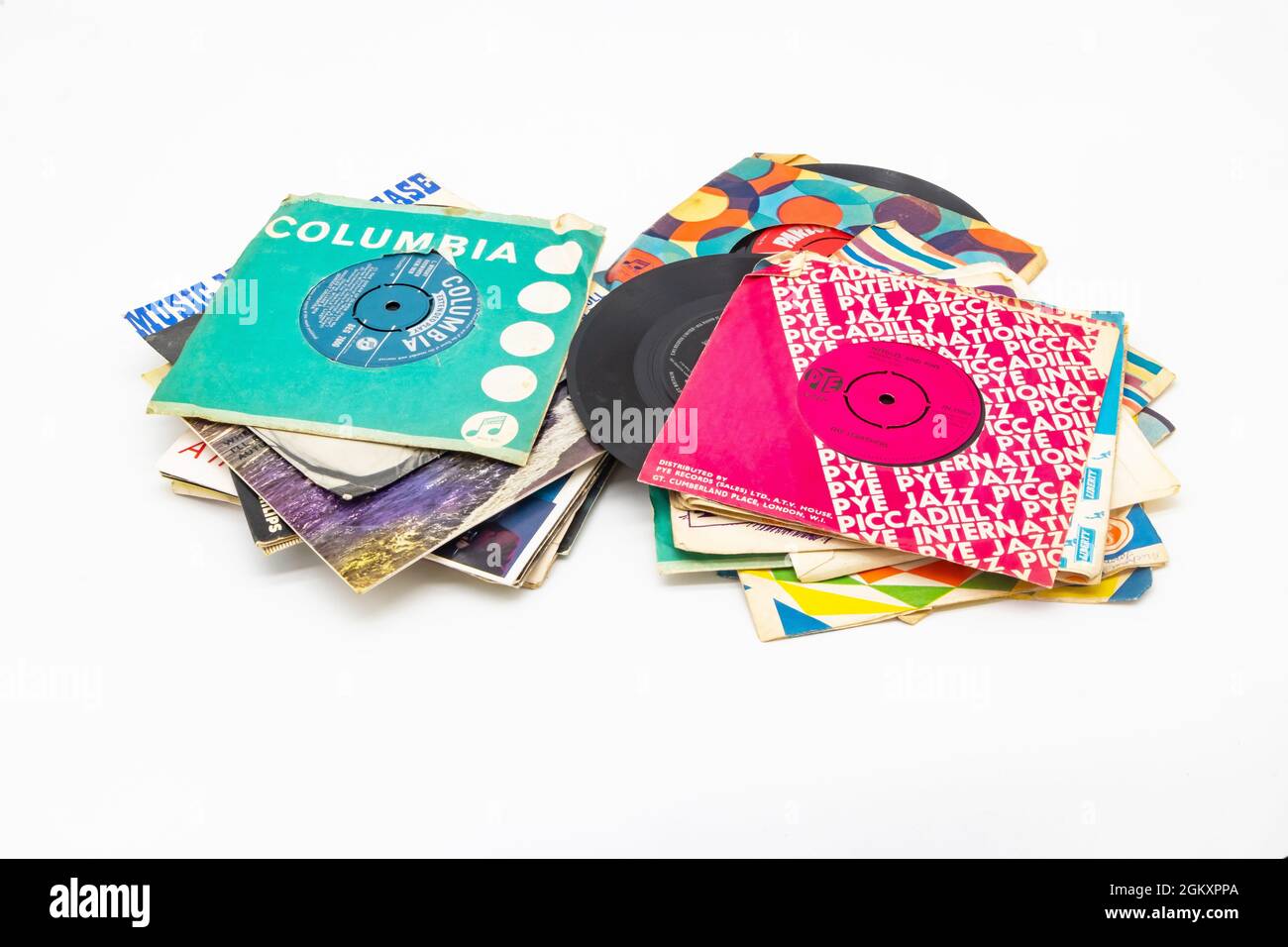 assorted seven inch single vinyl 45rpm records in colourful paper ...