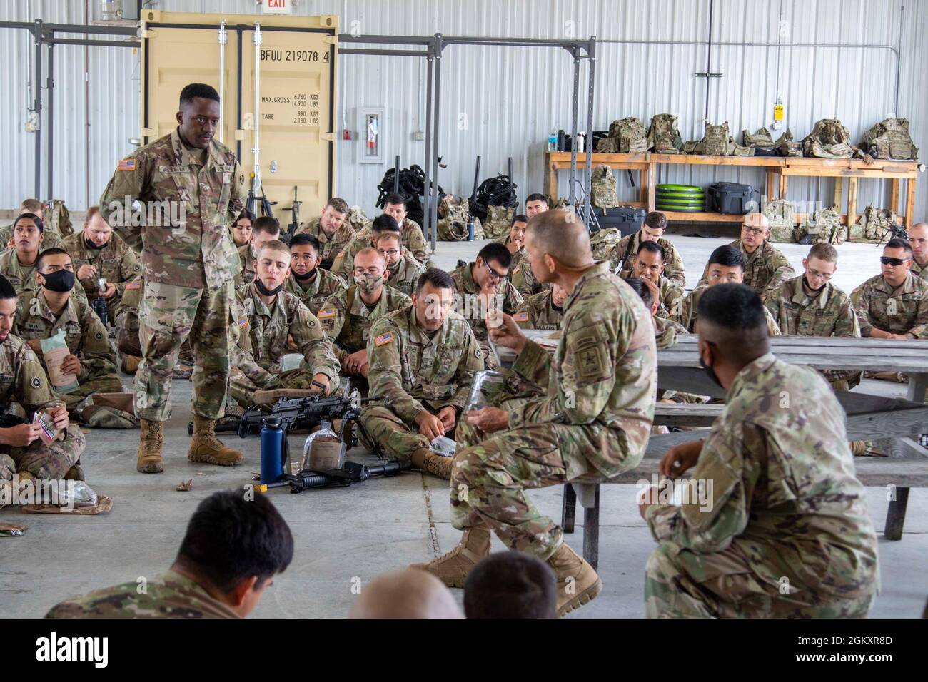 Sergeant Maj. of the Army Michael A. Grinston, eats meal-ready-to-eat ...