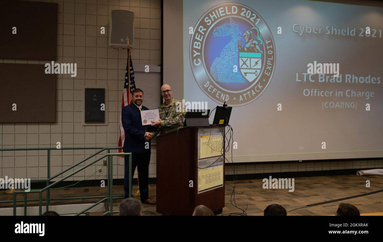 Lt. Col. Brad Rhodes, Cyber Shield Exercise Officer in Charge, awards ...