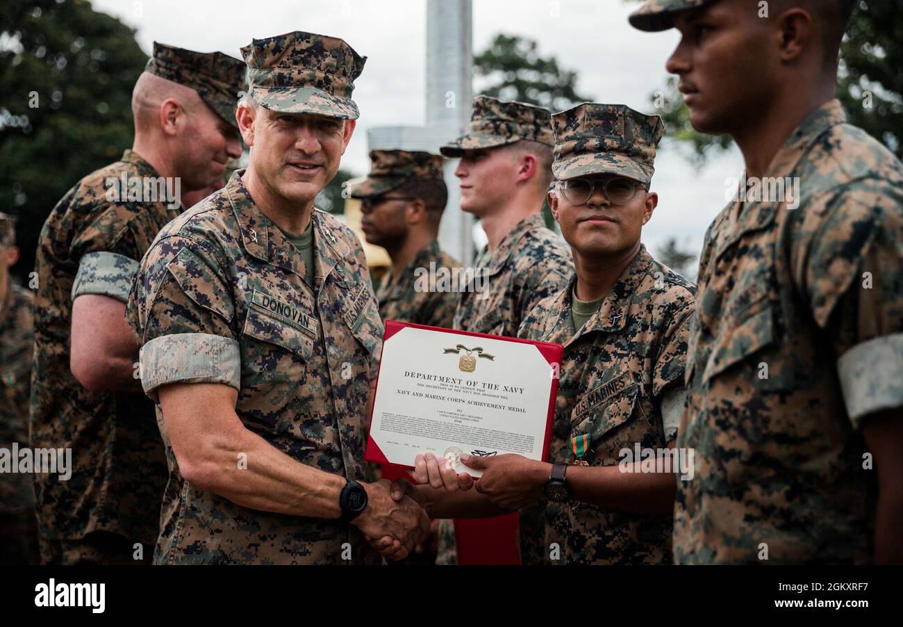 U.S. Marine Corps Lance Cpl. Eri Mejiajerez, right, a Seneca, Mo ...