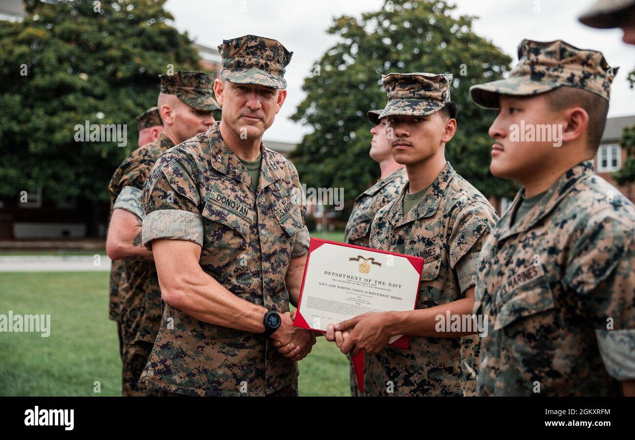 U.S. Marine Corps Cpl. Steven Ha, right, a San Jose, Calif., native and ...