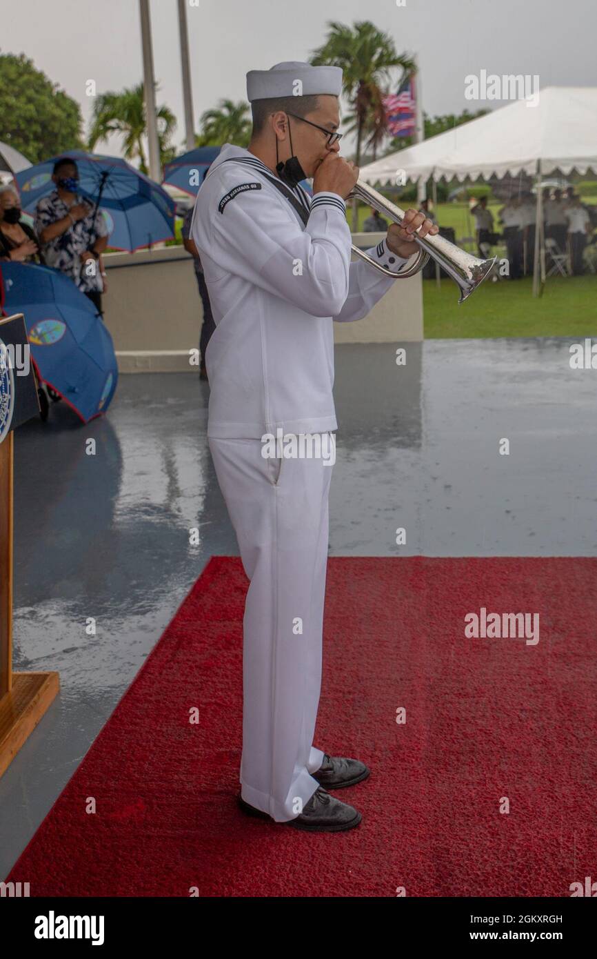 DC2 Alton Lewis, a damage controlman assigned to U.S. Naval Base Guam ...