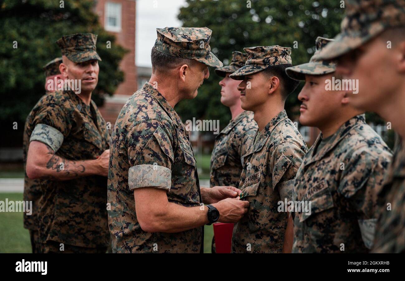 U.S. Marine Corps Cpl. Steven Ha, right, a San Jose, Calif., native and ...
