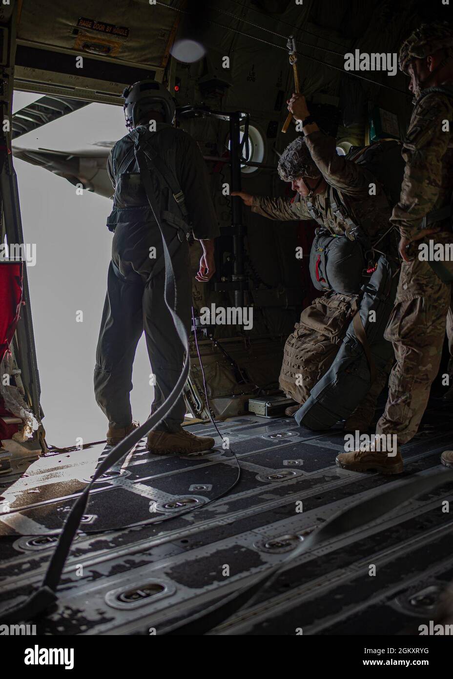 A U.S. Army paratrooper assigned to the 173rd Airborne Brigade scans ...