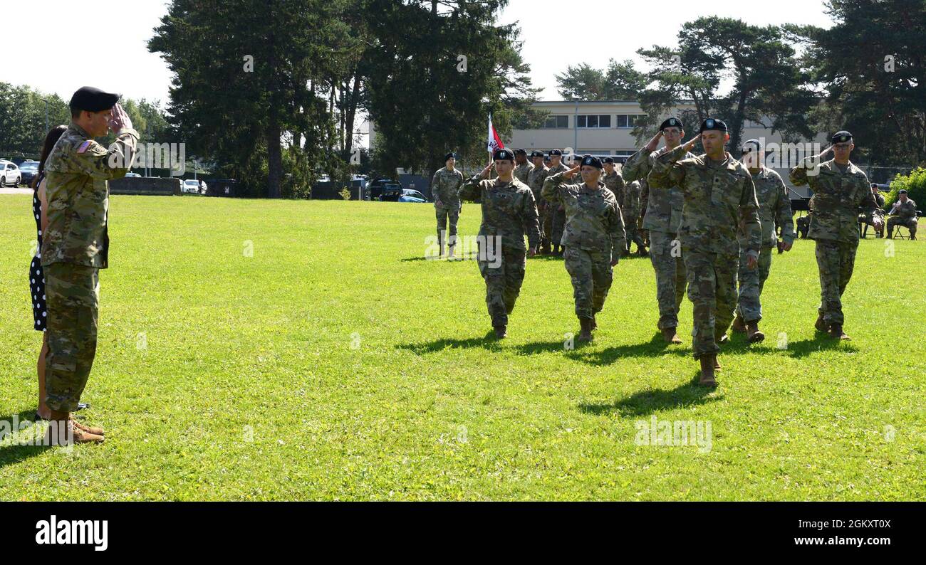 U.S. Army Lt. Col. Joshua Suthers, Acting Commander of Troops, renders ...