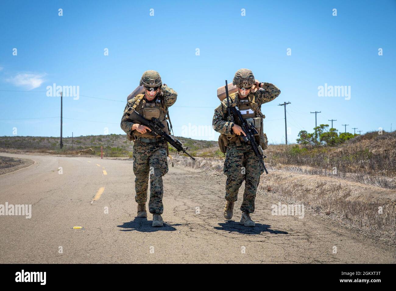 U.S. Marine Corps Lance Cpl. Cameron J. Gottschalk (left), a ...