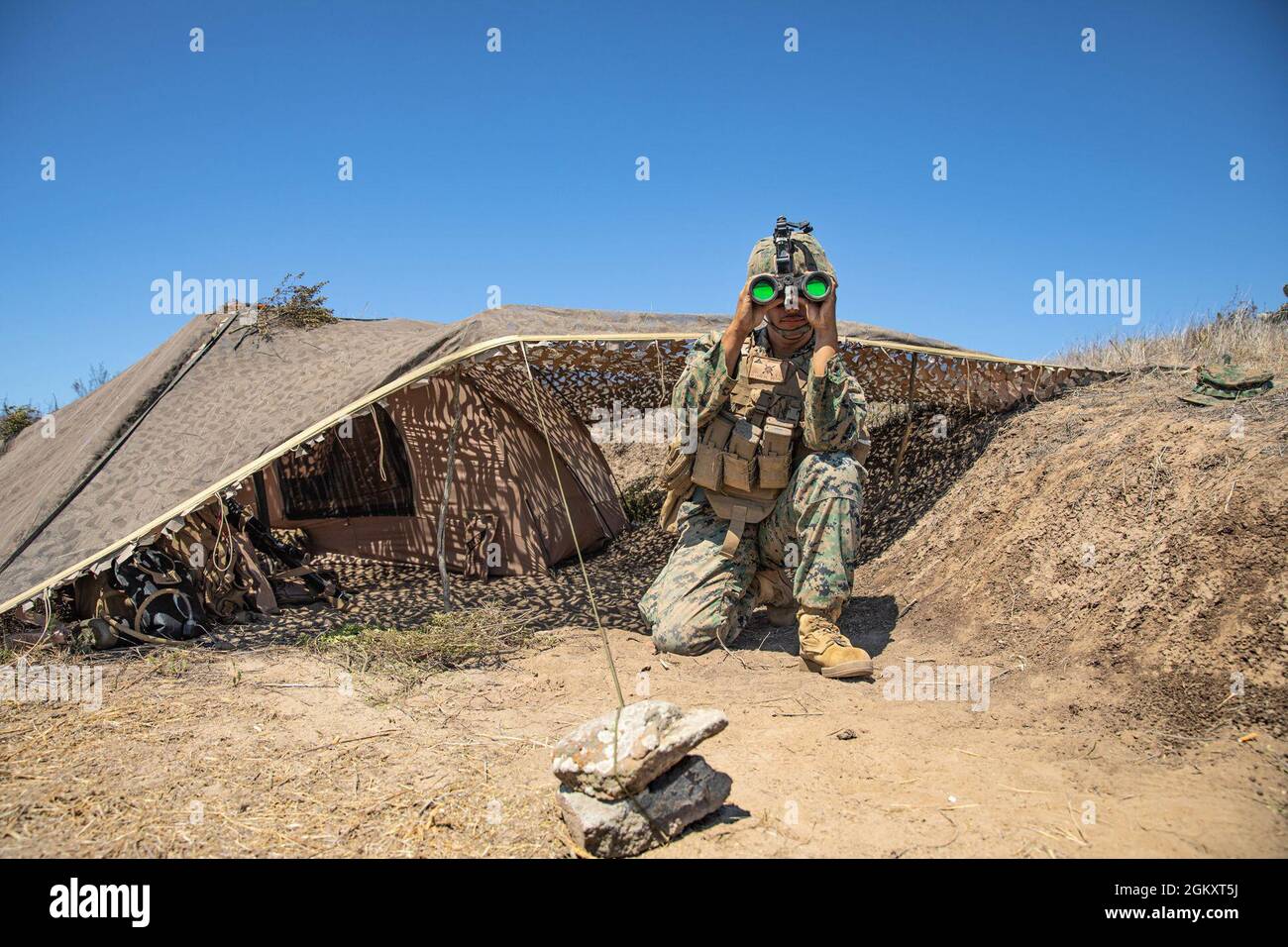 U.S. Marine Corps Lance Cpl. Dante G. Mannarino, a low altitude air ...