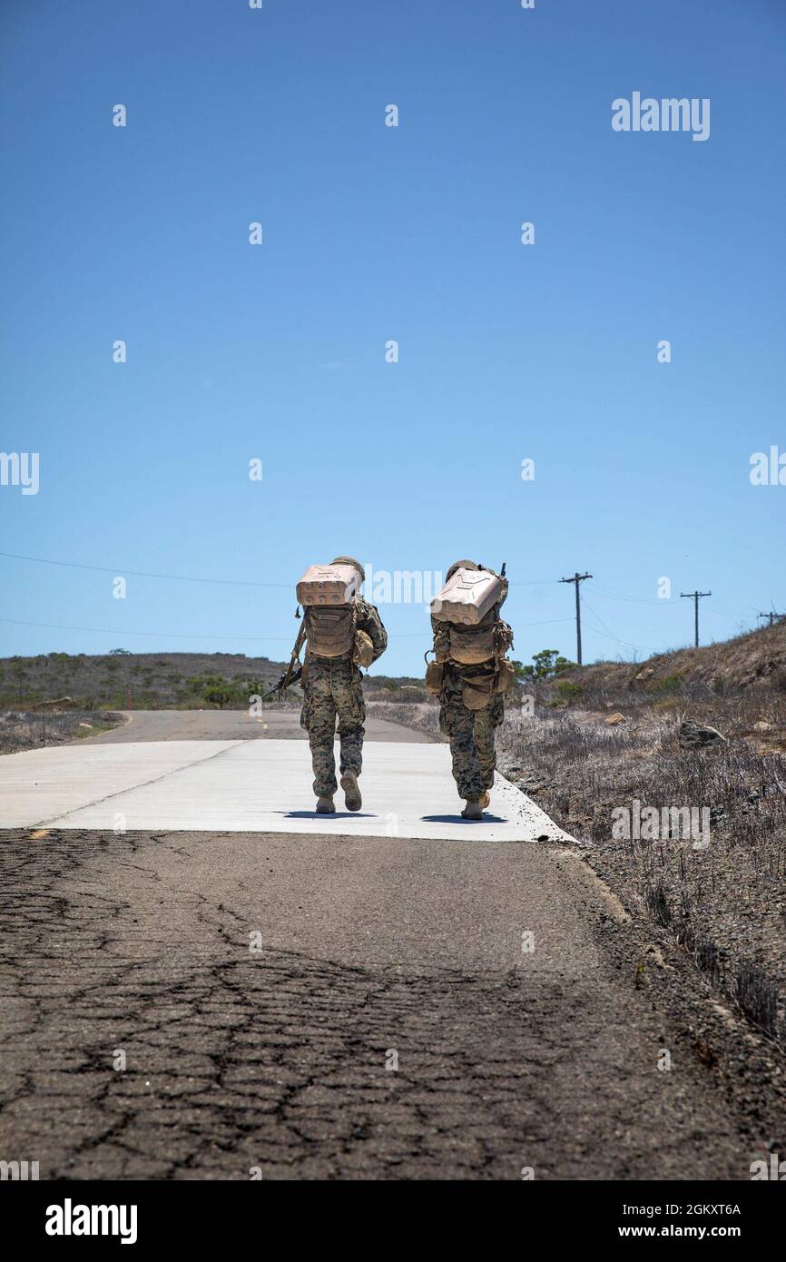 U.S. Marine Corps Lance Cpl. Cameron J. Gottschalk (left), a ...