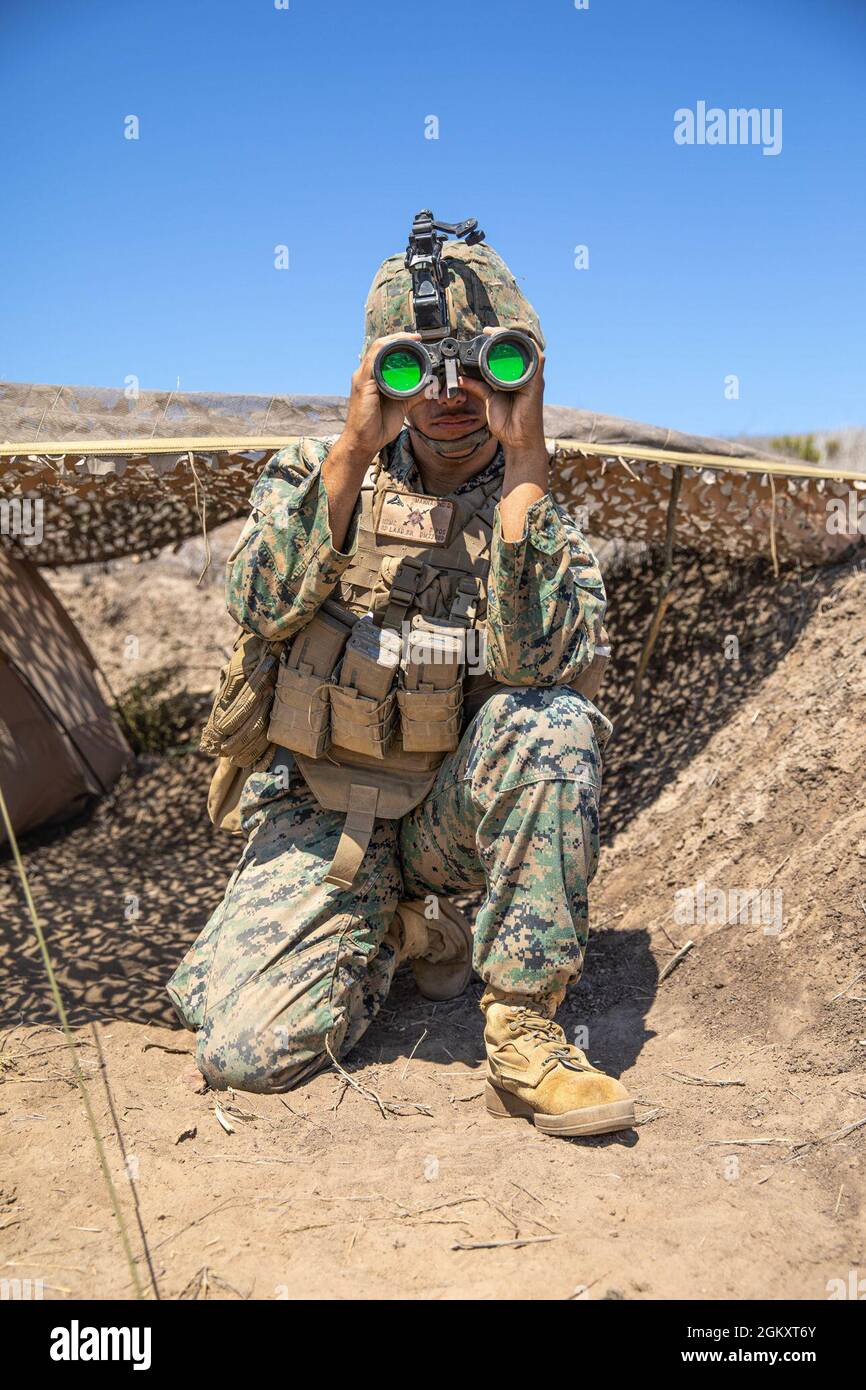 U.S. Marine Corps Lance Cpl. Dante G. Mannarino, a low altitude air ...
