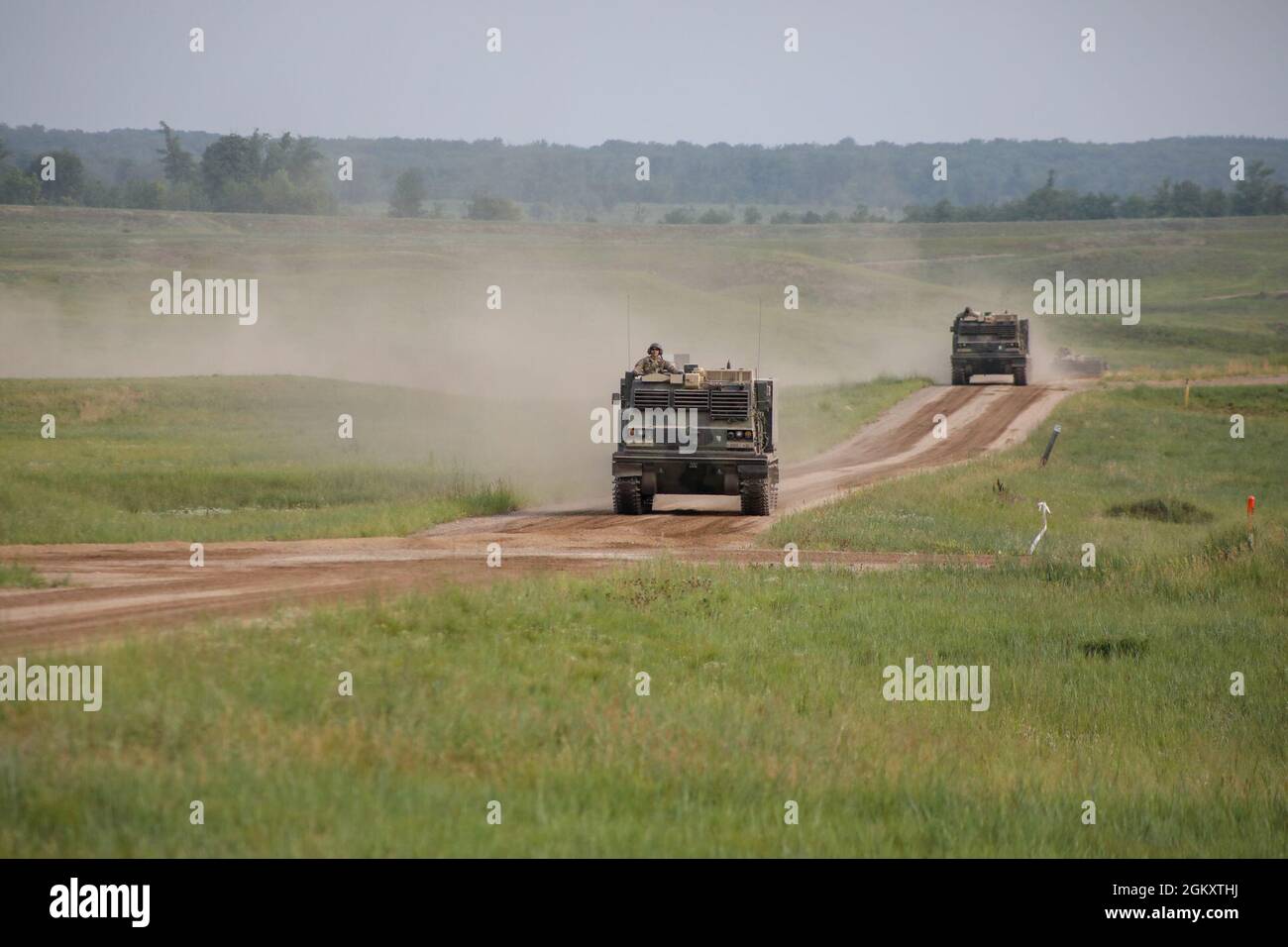 M270A1 MLRS from 1-147th FA, South Dakota National Guard, drive back ...