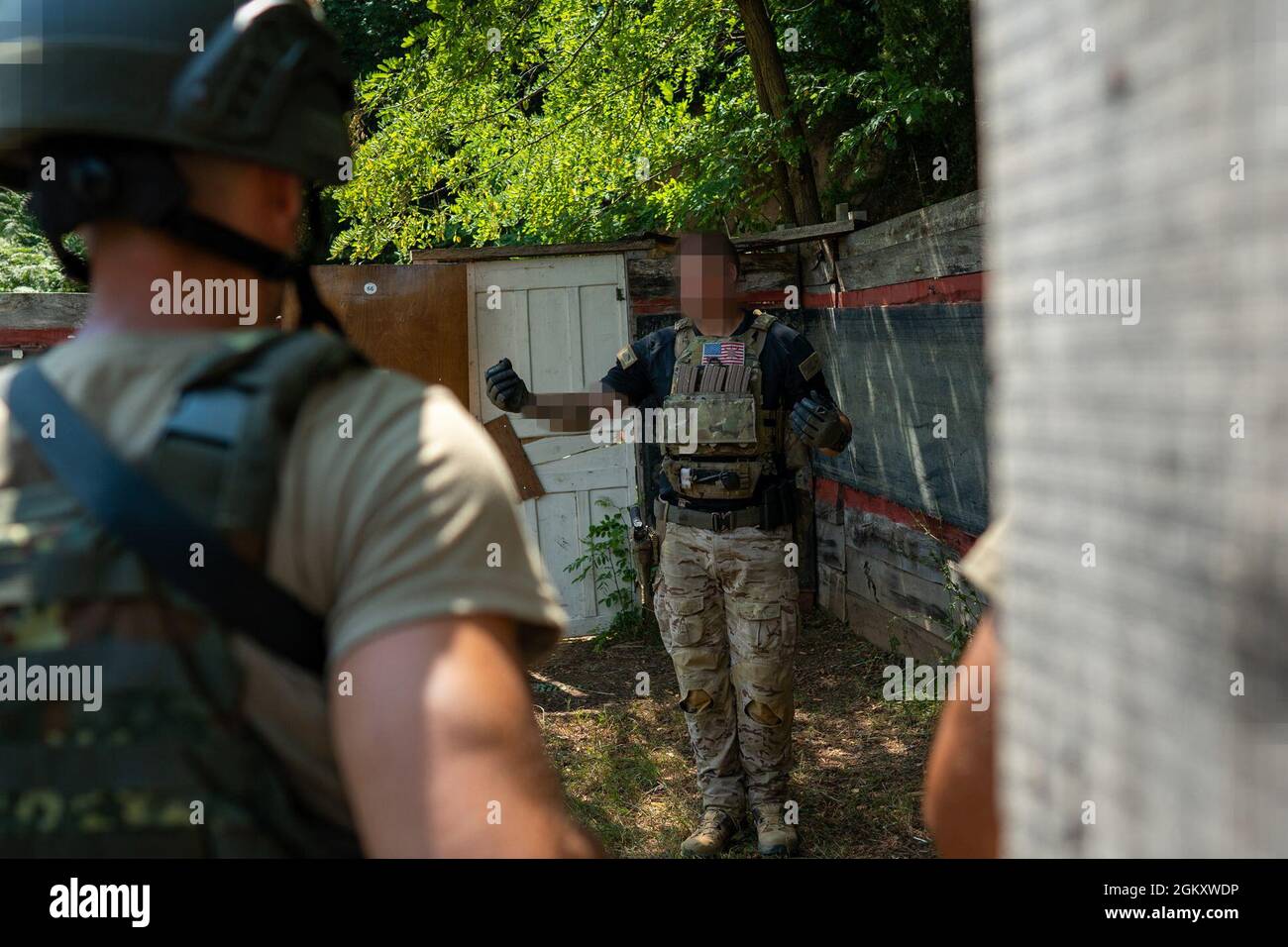 U.S. Army Green Berets assigned to 10th Special Forces Group observe ...