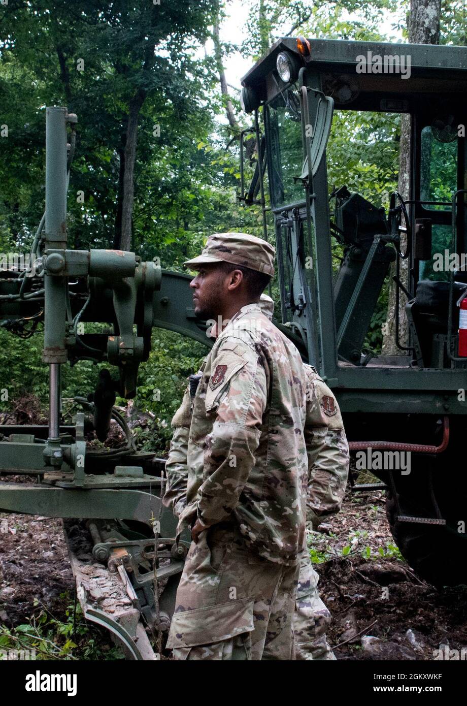 Members of the 143d Airlift Wing, Civil Engineer Squadron at a Command ...