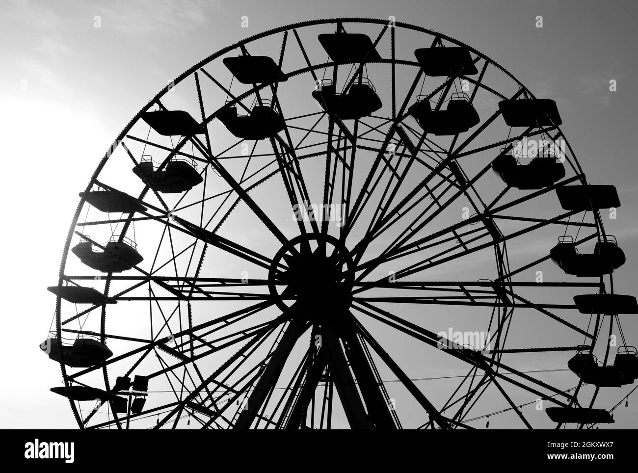 Ferris wheel of the amusement park with the seats that turn but without ...