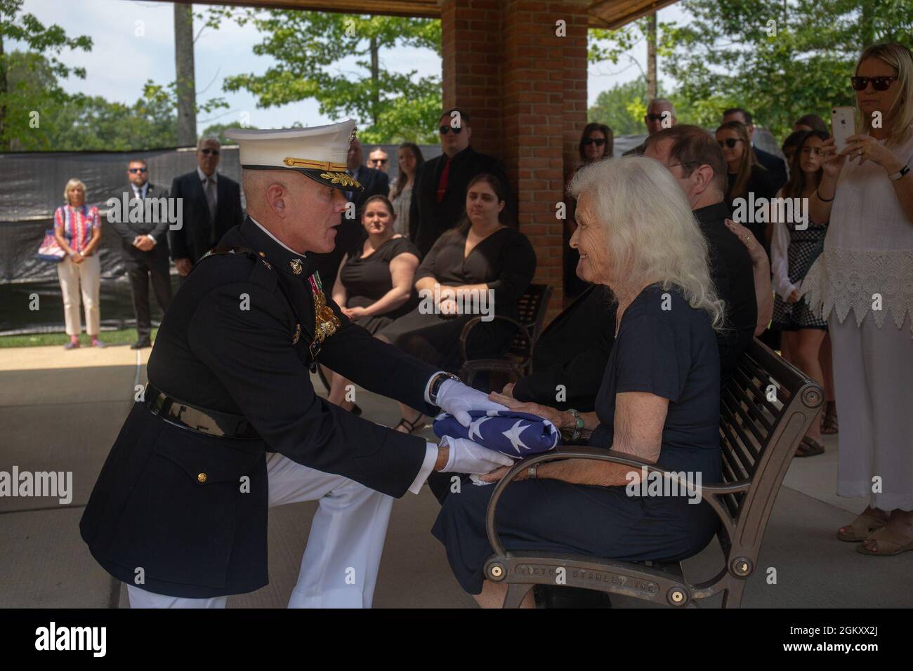 Nancy Porter, spouse of retired Brig. Gen. Robert R. Porter, receives ...