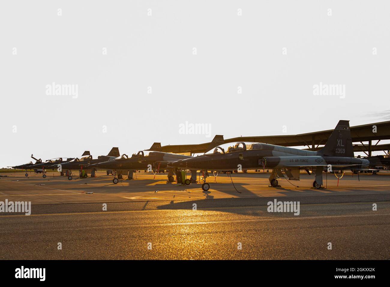 A group of T-38 Talons stand by on the flight line awaiting the first ...