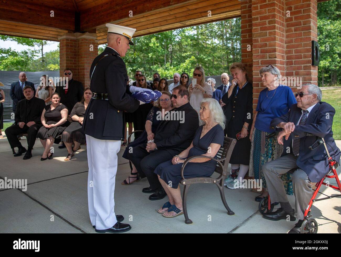 Nancy Porter, spouse of retired Brig. Gen. Robert R. Porter, receives ...