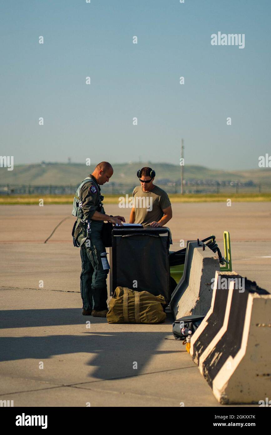 Lt. Col. Steve Schultz, 175th Fighter Squadron pilot, and Master Sgt ...