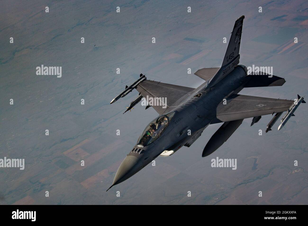 Capt. Guy Bauermeister, a pilot with the114th Fighter Wing, flies near ...