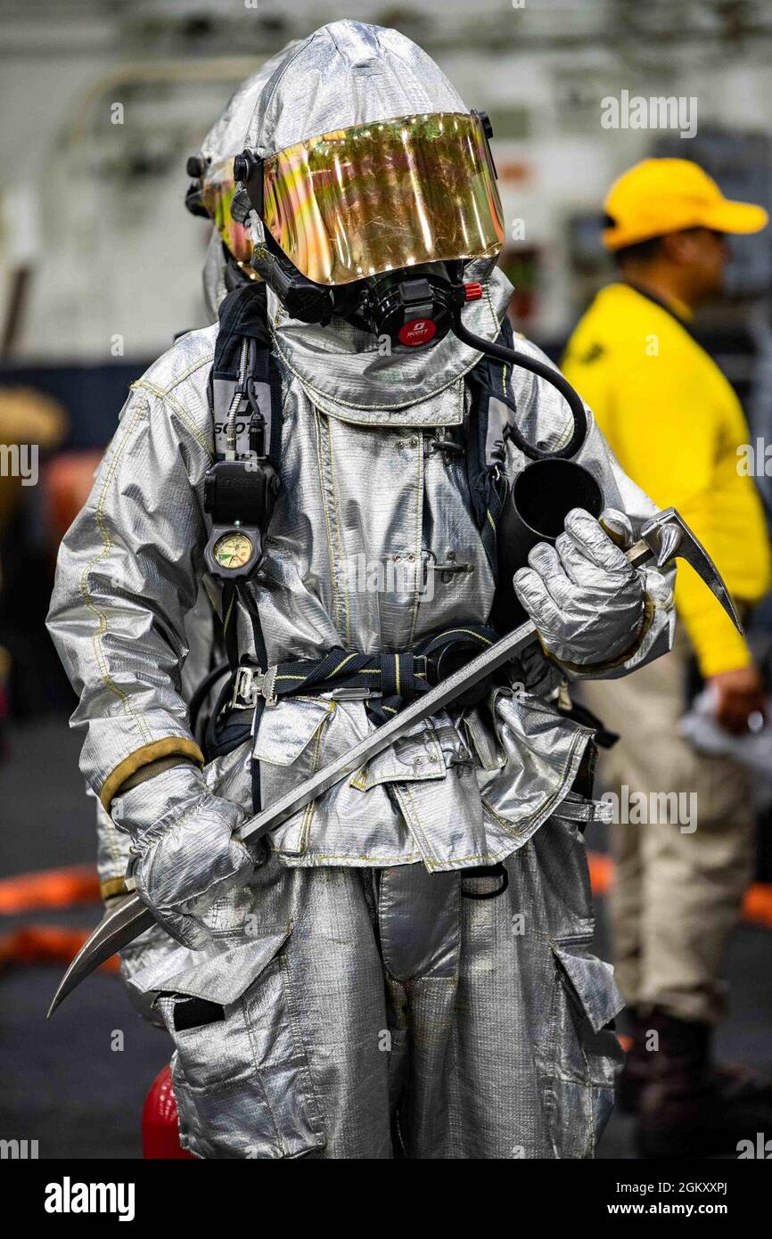 210722-N-LP924-1104 PACIFIC OCEAN (July 22, 2021) A Sailor dons a ...