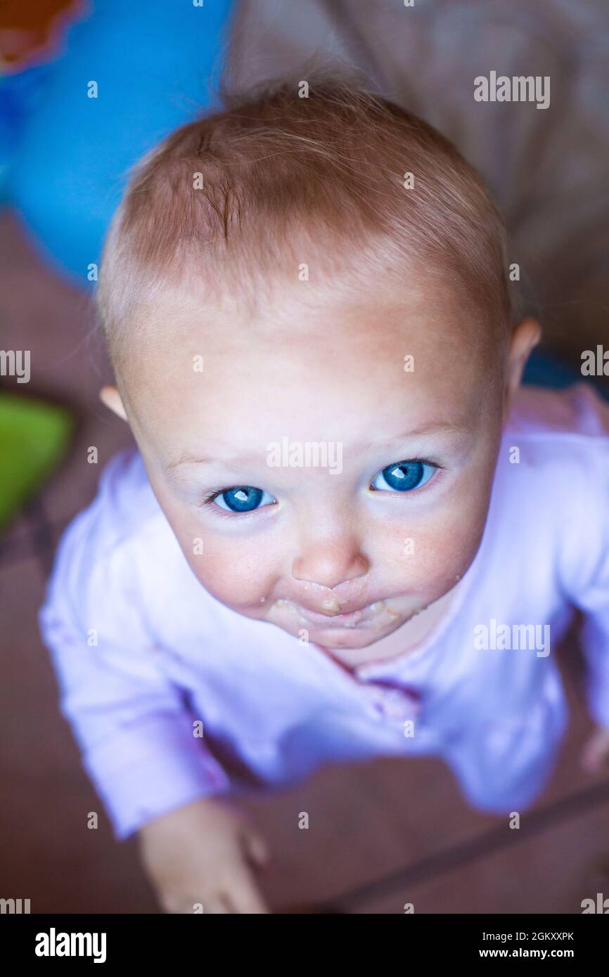 Kid straight face hi-res stock photography and images - Alamy