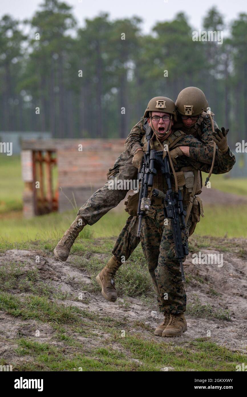 U.S. Marine Corps Pfc. Own Conklin, from Montross, Virginia, carries ...