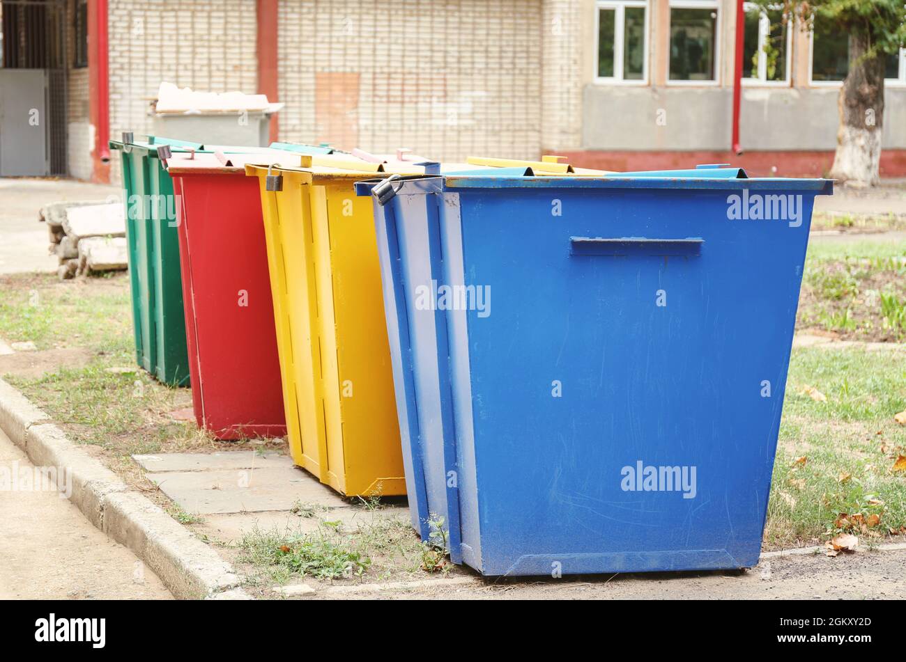 Recycling bins for different types of garbage outdoors Stock Photo - Alamy