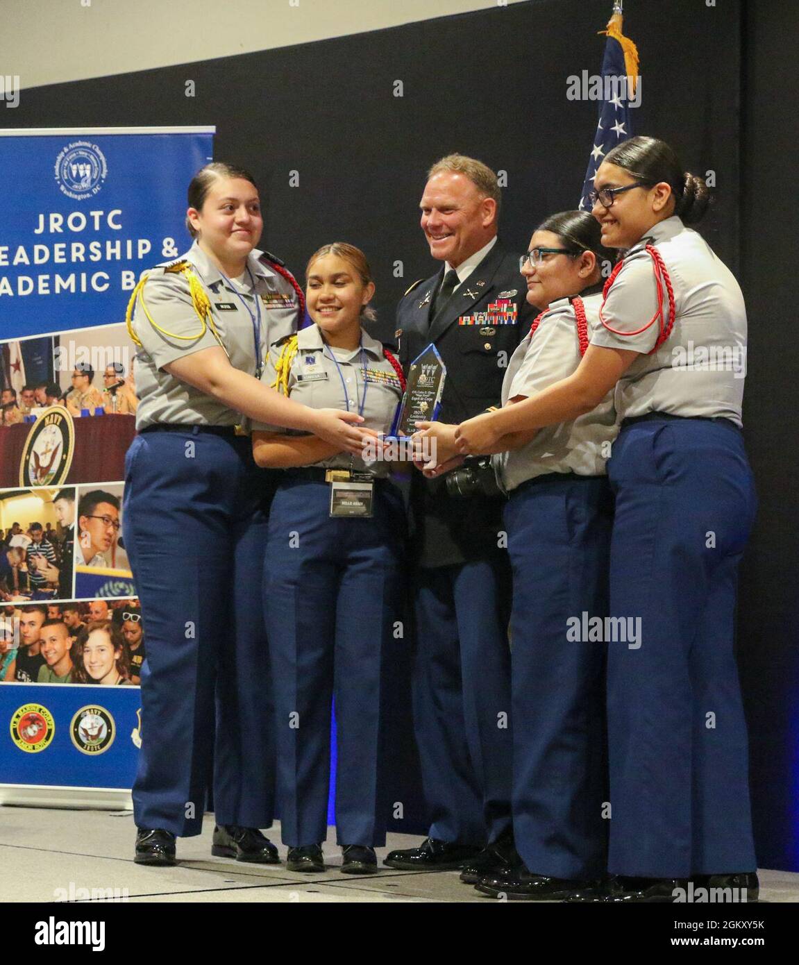 Col. Steve Smith, Army JROTC director, presents the Col. Carlos R ...