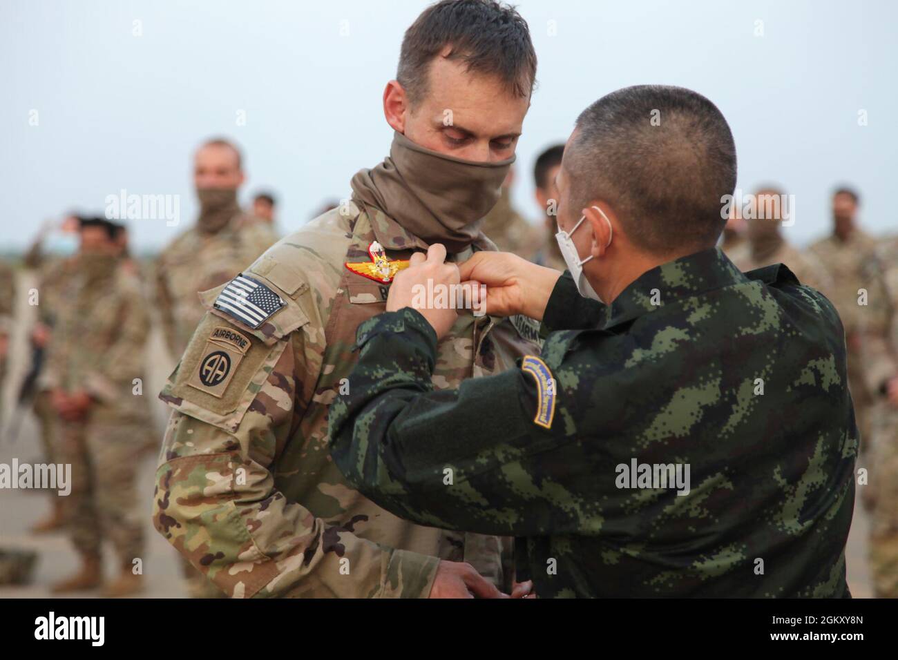 A Royal Thai Army Paratrooper pins Thailand Airborne Wings on Lt. Col ...