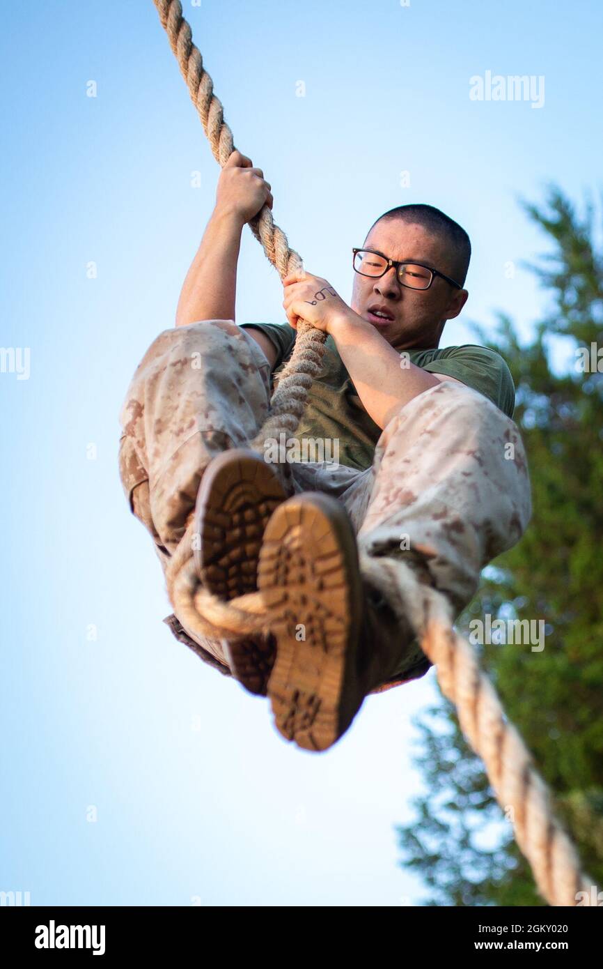 A U.S. Marine Corps officer candidate with Lima Company participates in ...