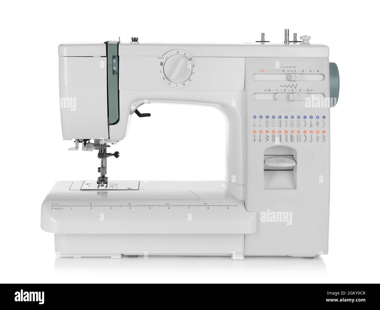 Sewing machine on white background Stock Photo - Alamy