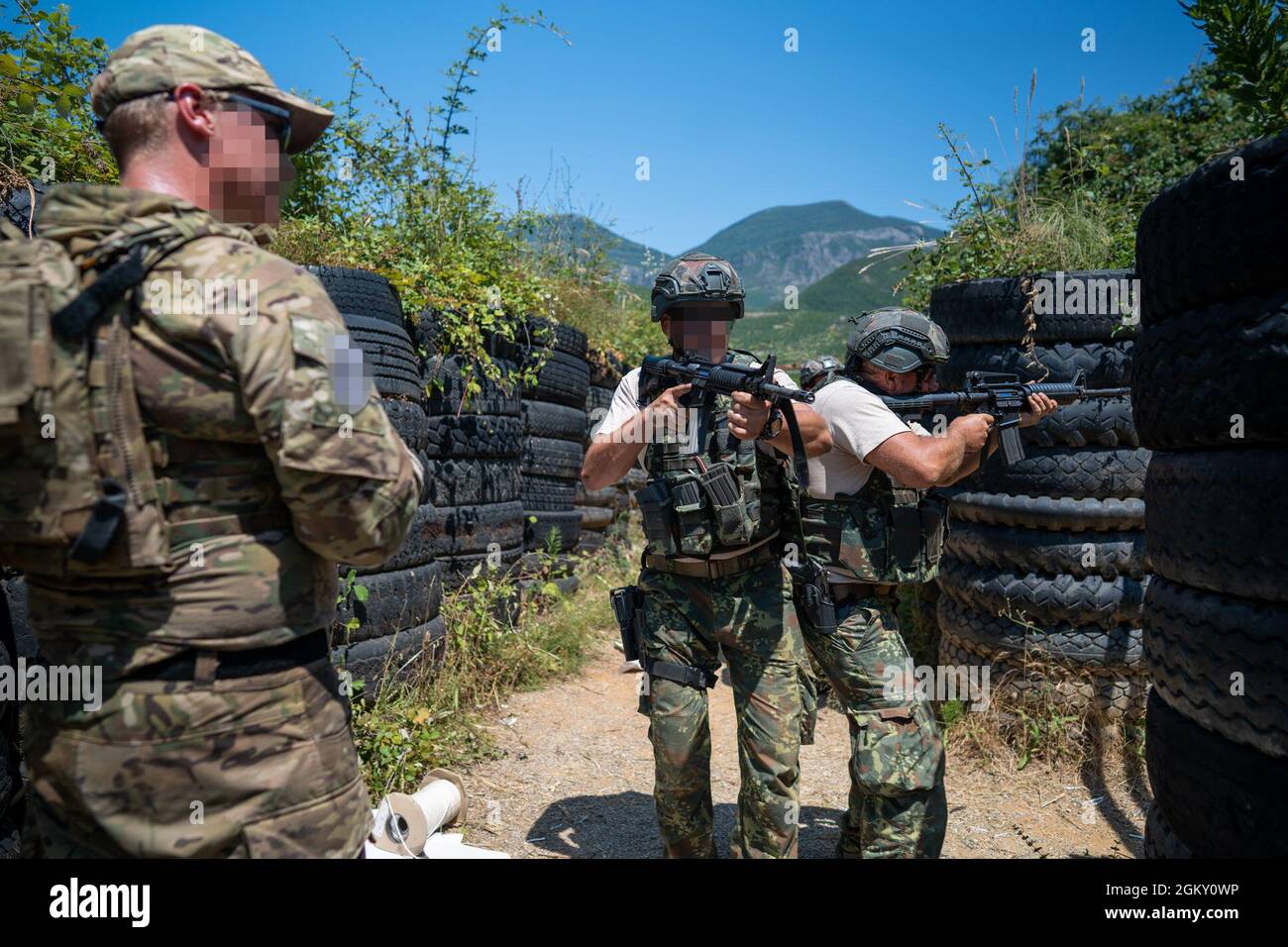 A U.S. Army Green Beret assigned to 10th Special Forces Group observes ...