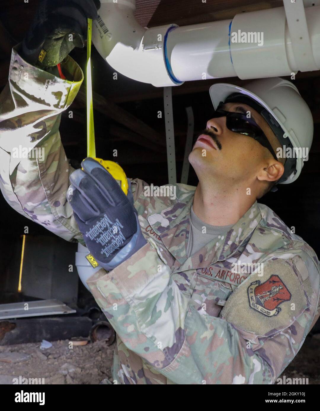 Members of the 143d Airlift Wing, Civil Engineer Squadron at a Command ...