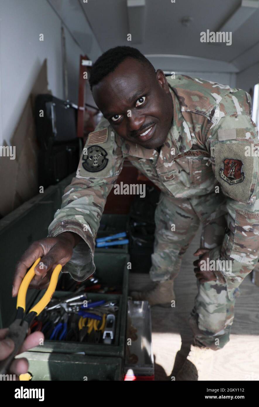 Members of the 143d Airlift Wing, Civil Engineer Squadron at a Command ...