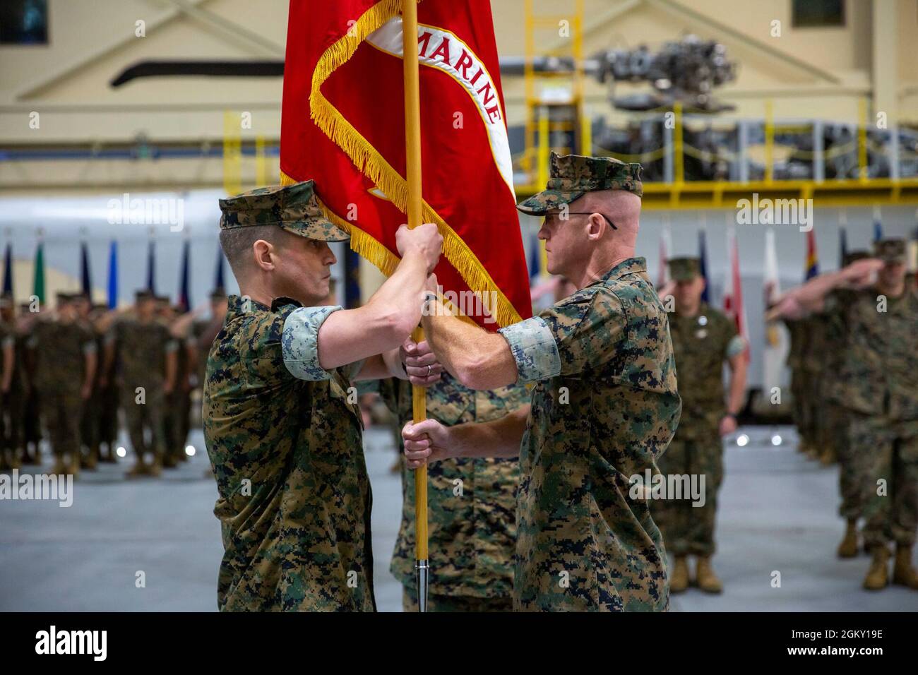 U.S. Marine Corps Lt. Col. Marc Blankenbicker, left, incoming ...
