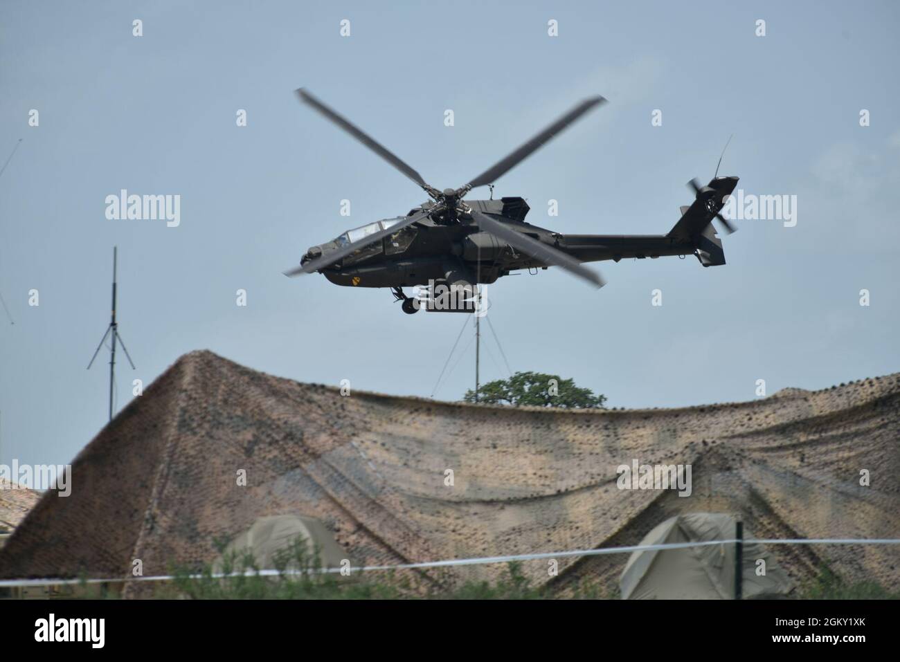 An Apache helicopter from 1st Cavalry Division flew over guardsmen ...