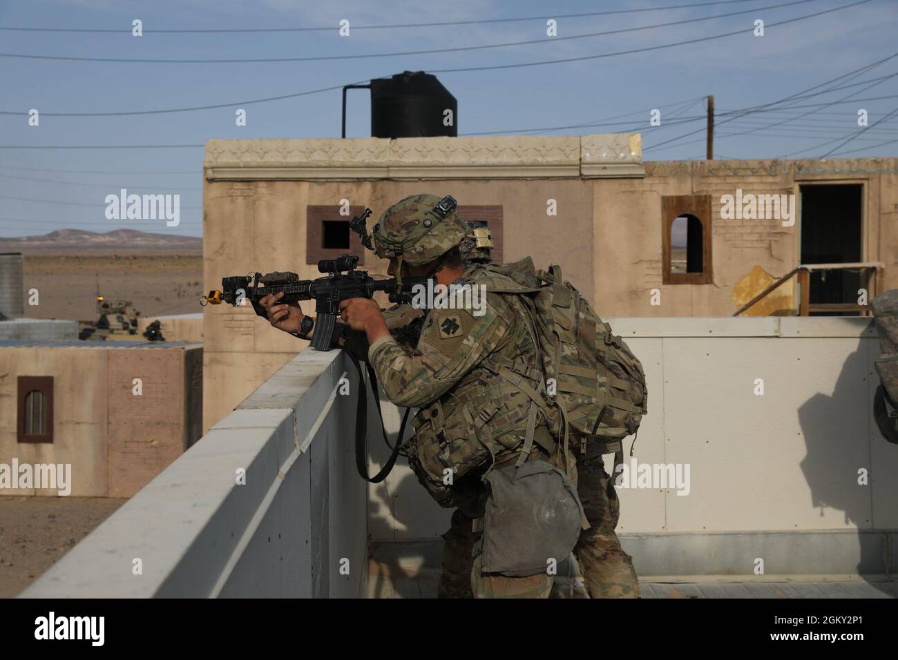 A Soldier of the 45th Infantry Brigade Combat Team fires upon members ...