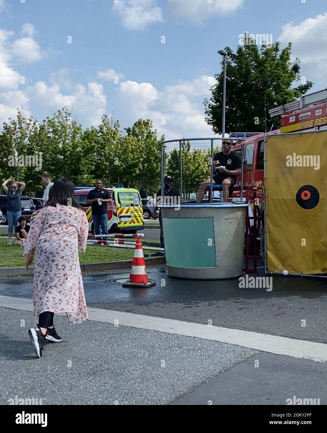 Garrison Wiesbaden Commander, Col. Mario Washington, takes his turn in ...