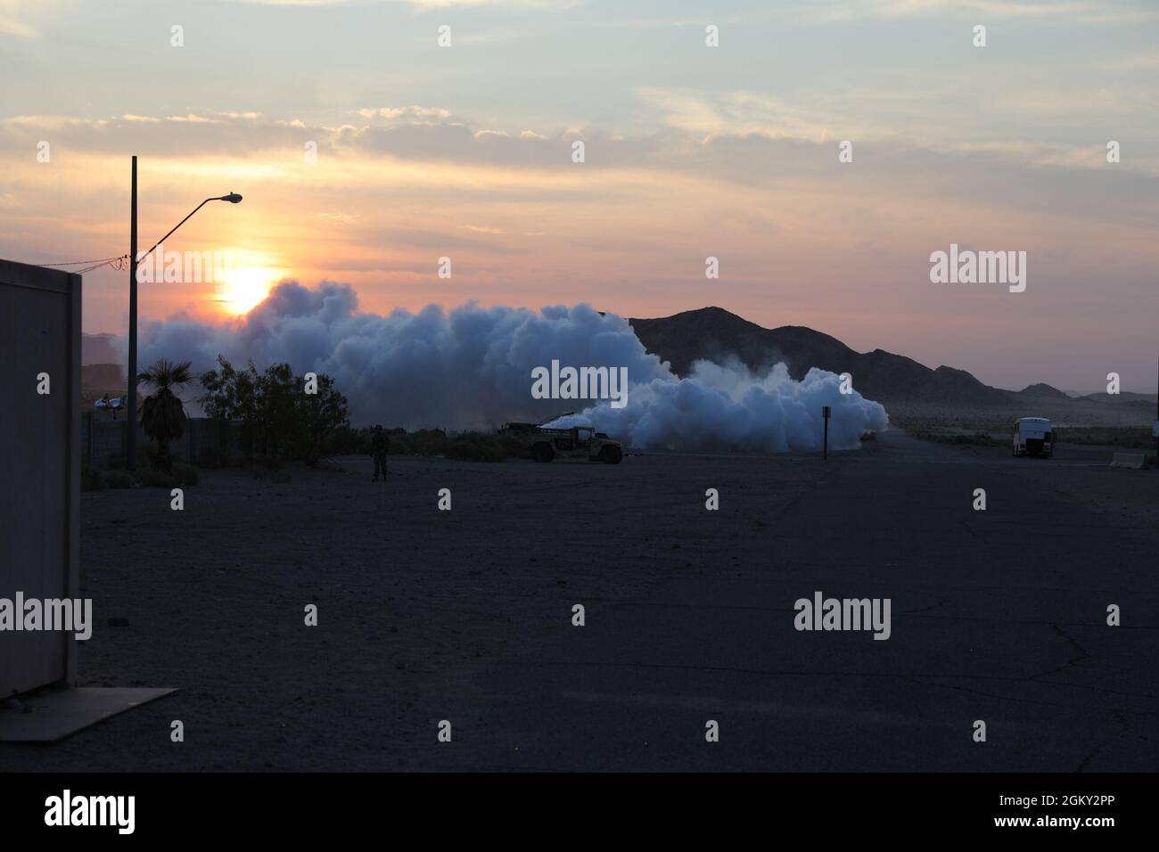 Members of the 45th Infantry Brigade Combat Team use smoke to conceal ...
