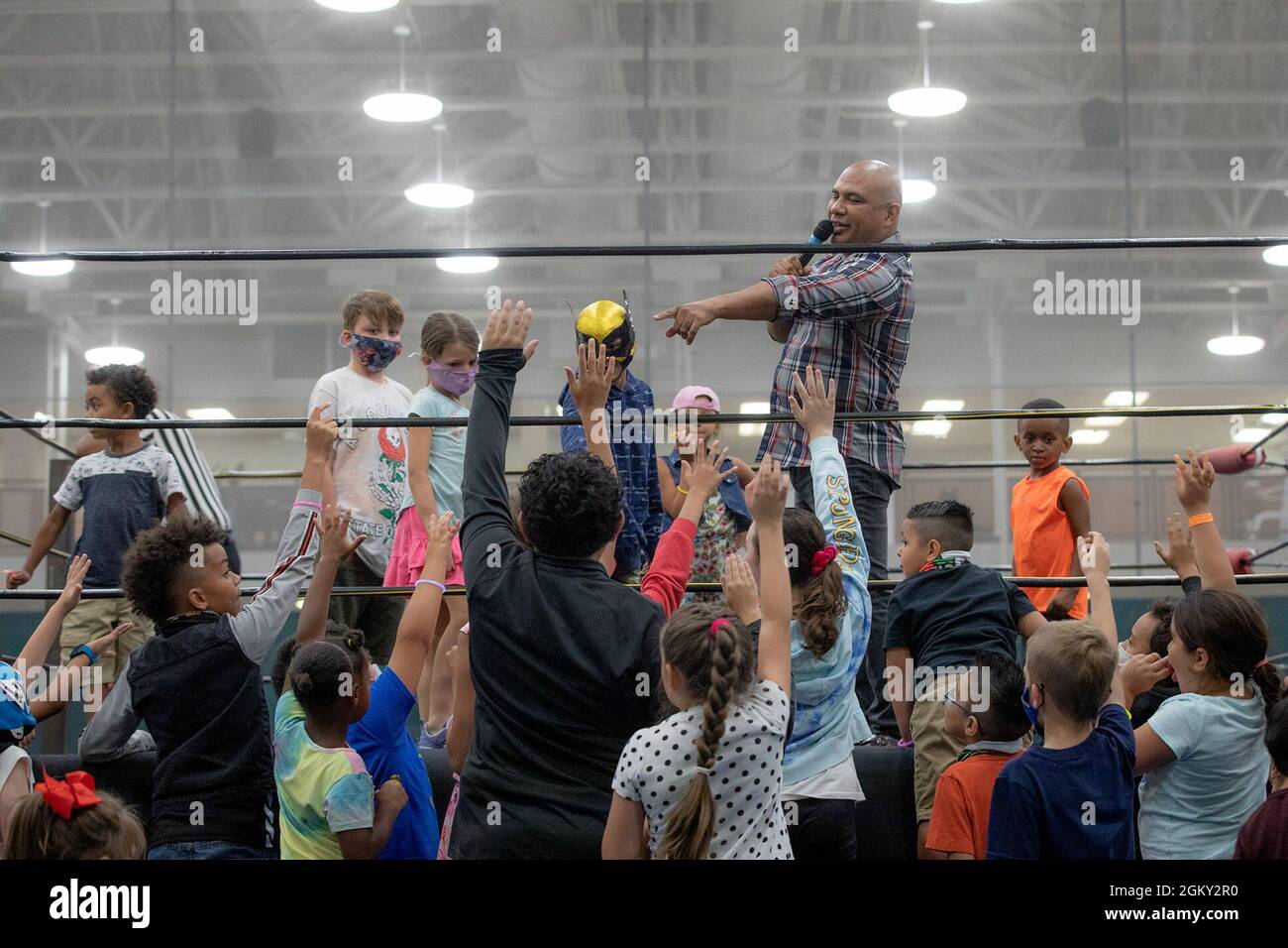 Lucha Frontera’s DJ Voz holds a tumbling competition for military kids ...