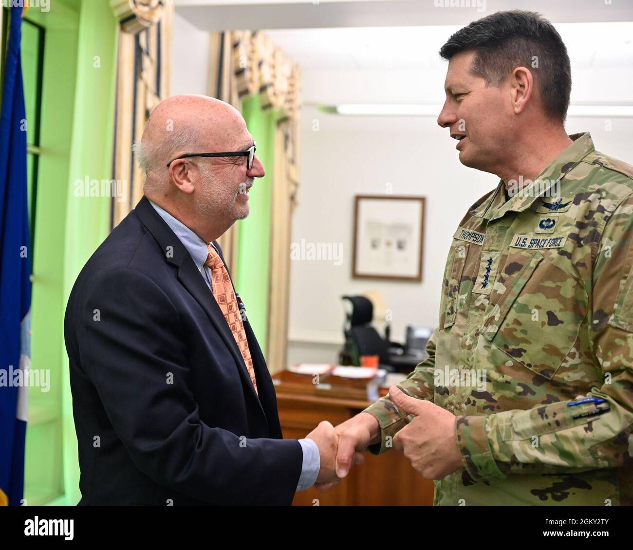 Acting Secretary of the Air Force John P. Roth shakes hands with Vice ...