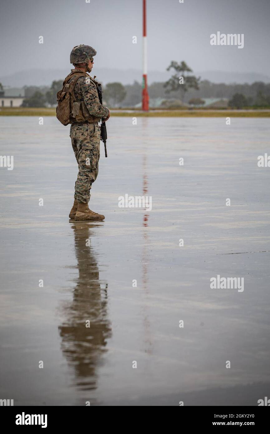 U.S. Marine Corps Lance Cpl. Chad Miller, a cannoneer with Golf Battery ...