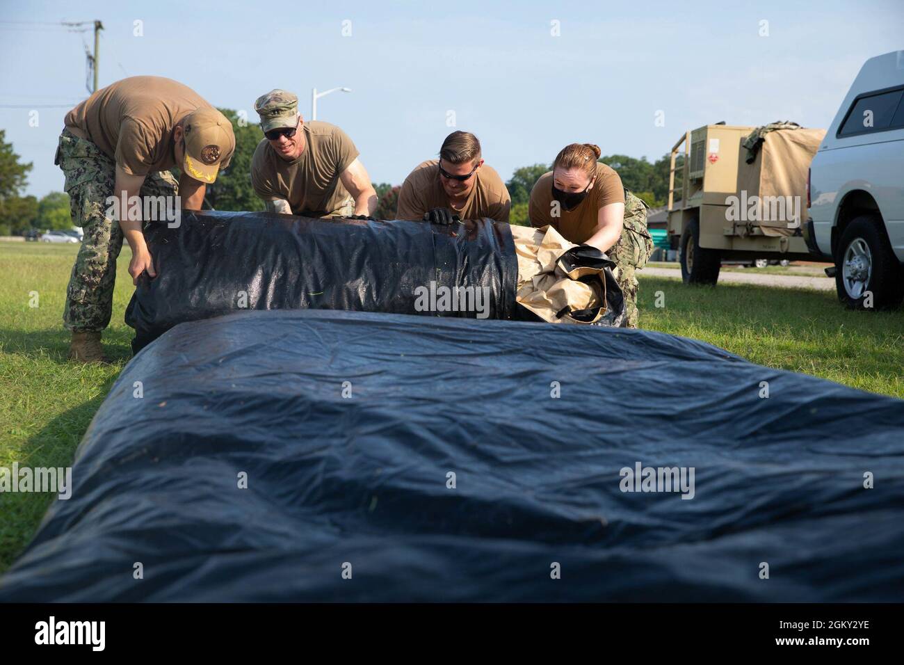 JOINT BASE LANGLEY-EUSTIS, Va. (July 23, 2021) From left, Navy Cmdr ...