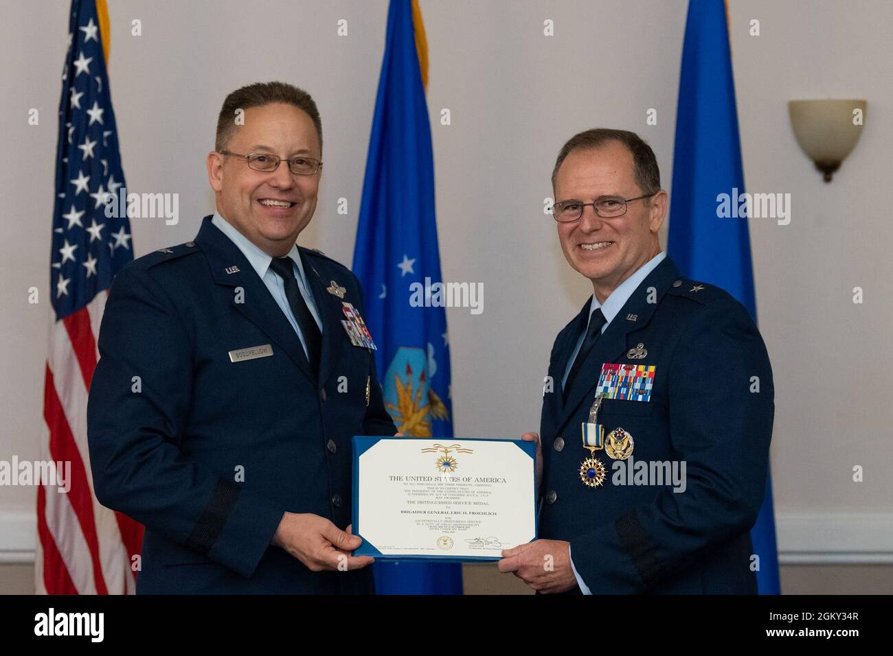 Brig. Gen. Gerald Goodfellow, left, retired, presents the Distinguished ...